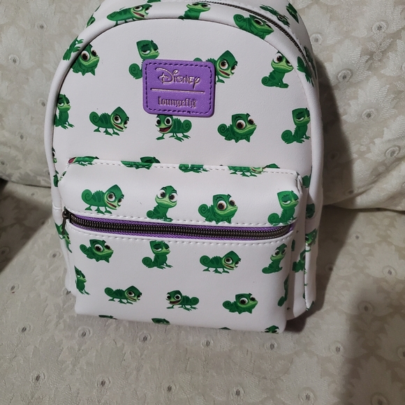 Loungefly | Bags | Loungefly Disney Pascal Tangled Backpack | Poshmark